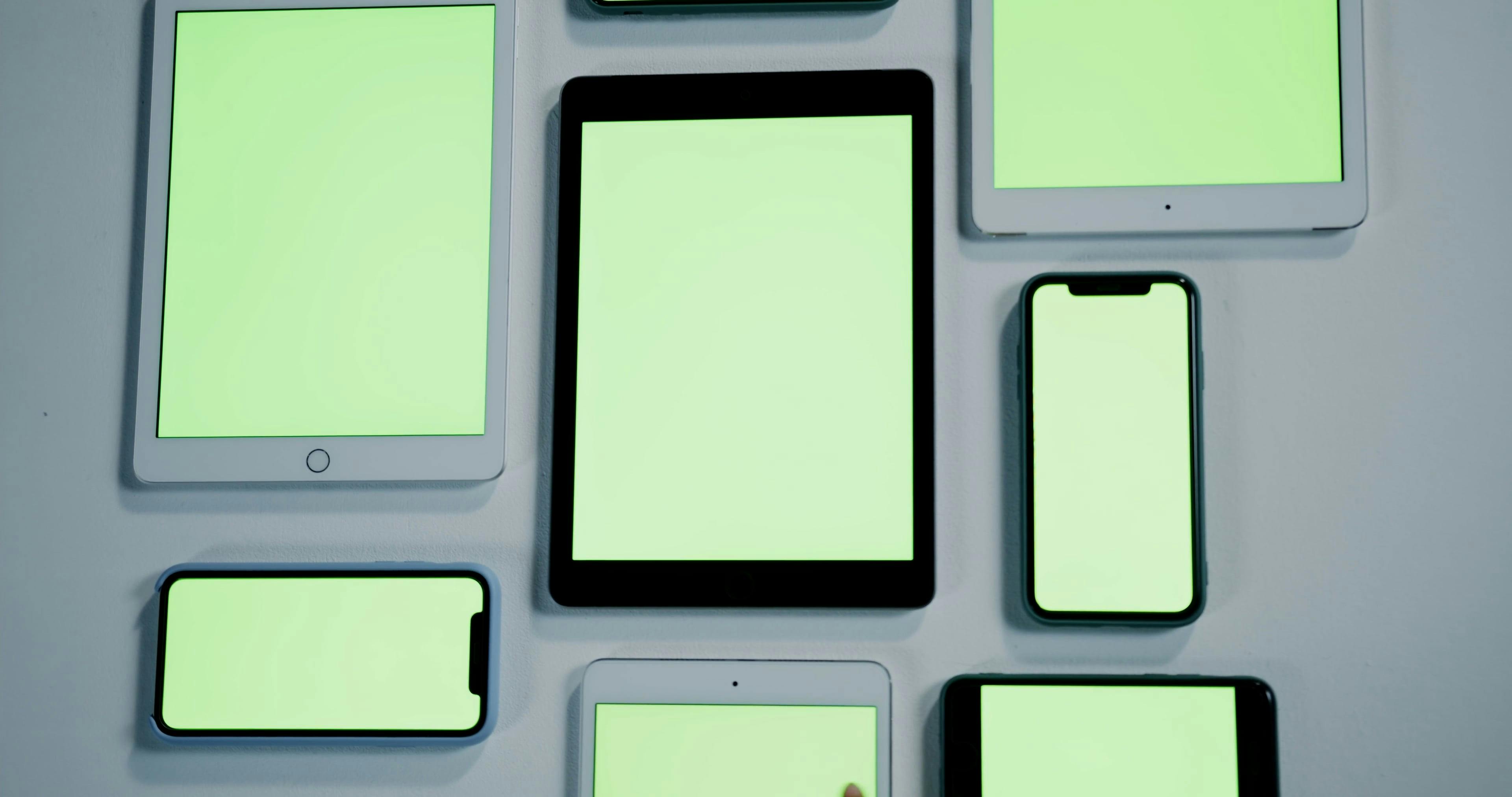 A Child Scrolling on Multiple Gadgets · Free Stock Video