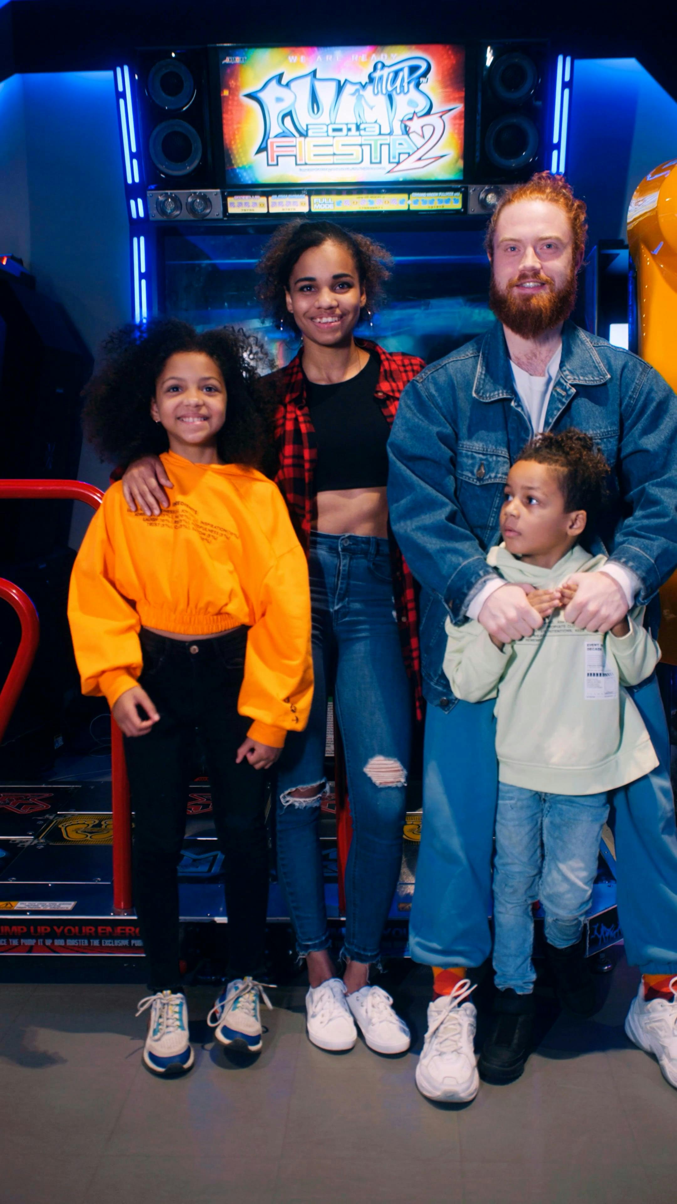 A Family Posing at an Amusement Arcade Free Stock Video Footage ...