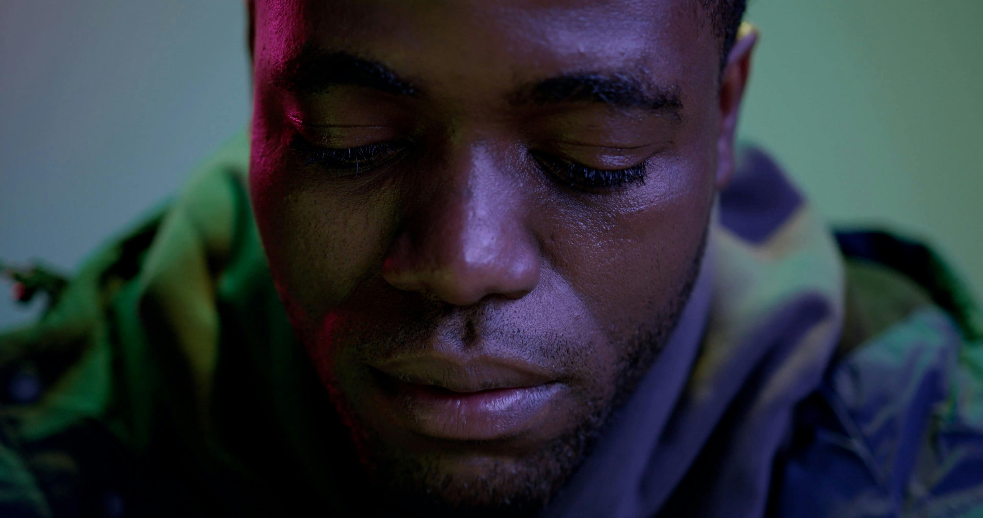 Close-up Footage of a Sad Man Writing on a Cardboard Free Stock Video ...