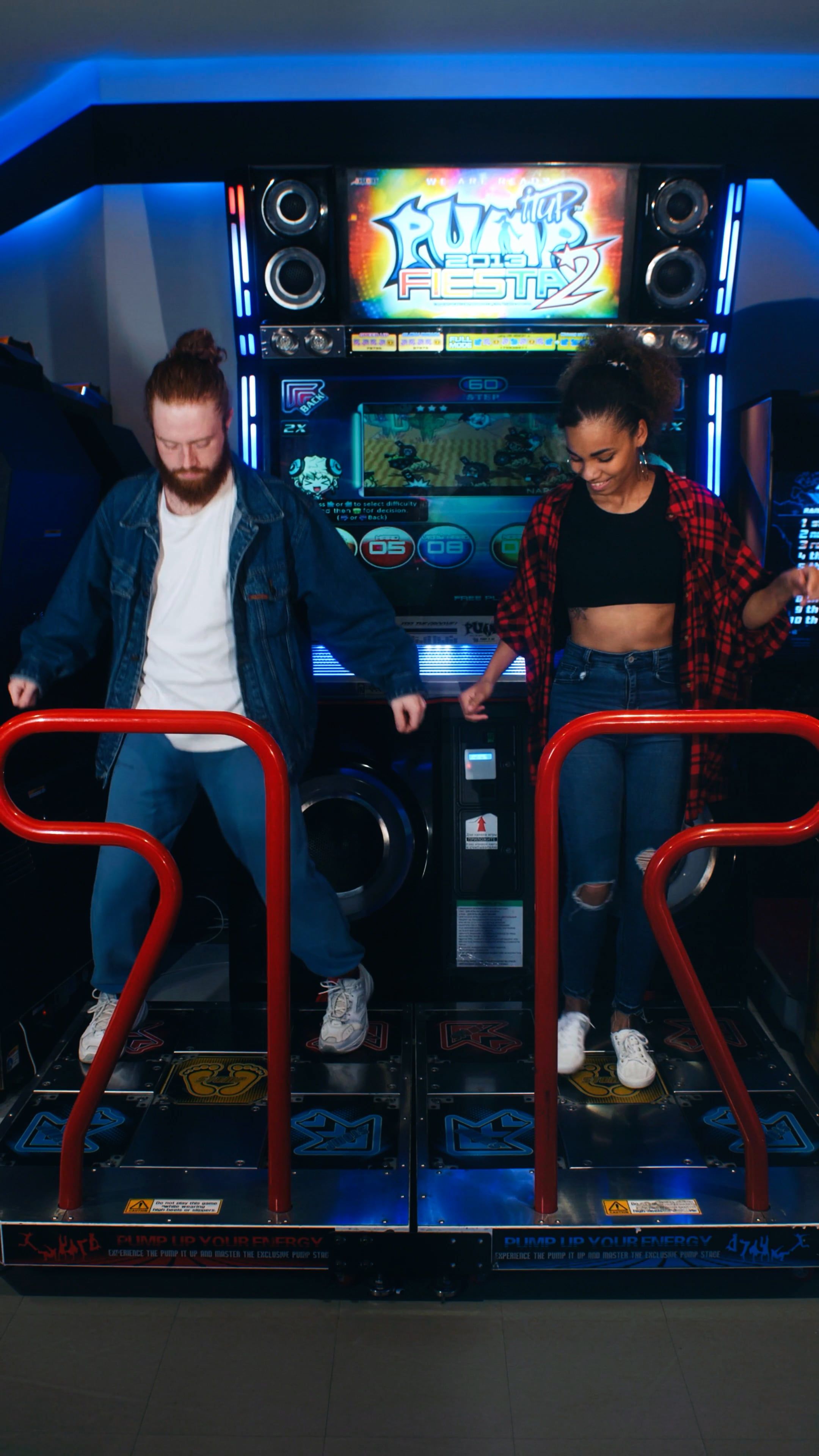 Man and woman playing dancing game in arcade Free Stock Video Footage ...