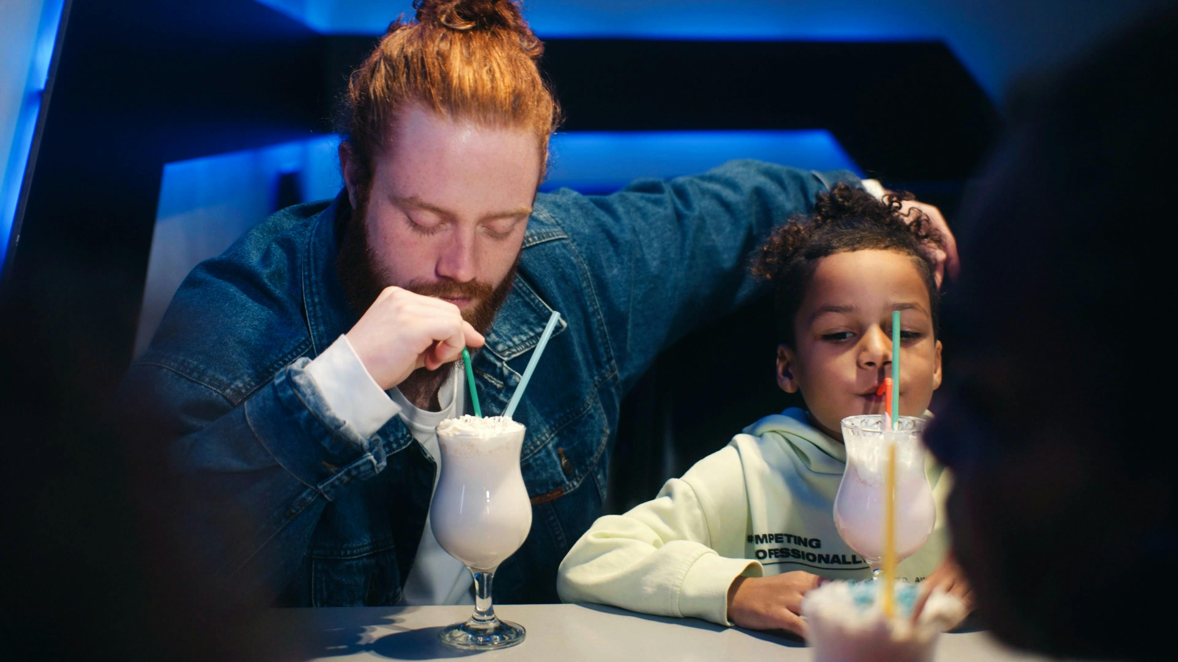 A Father and his Son Drinking Milkshakes Free Stock Video Footage ...