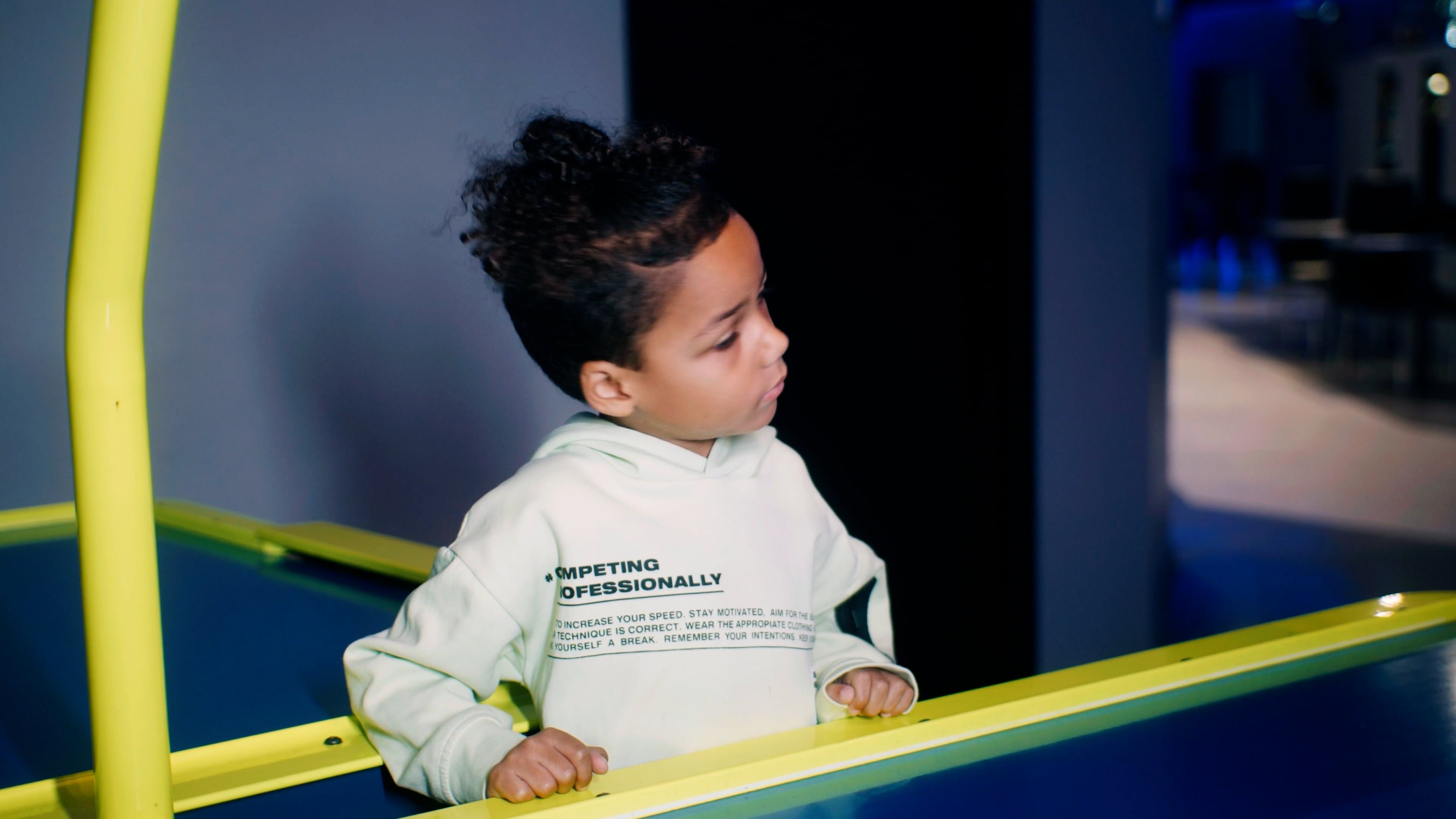 A Little Boy Watching an Air Hockey Game Free Stock Video Footage ...