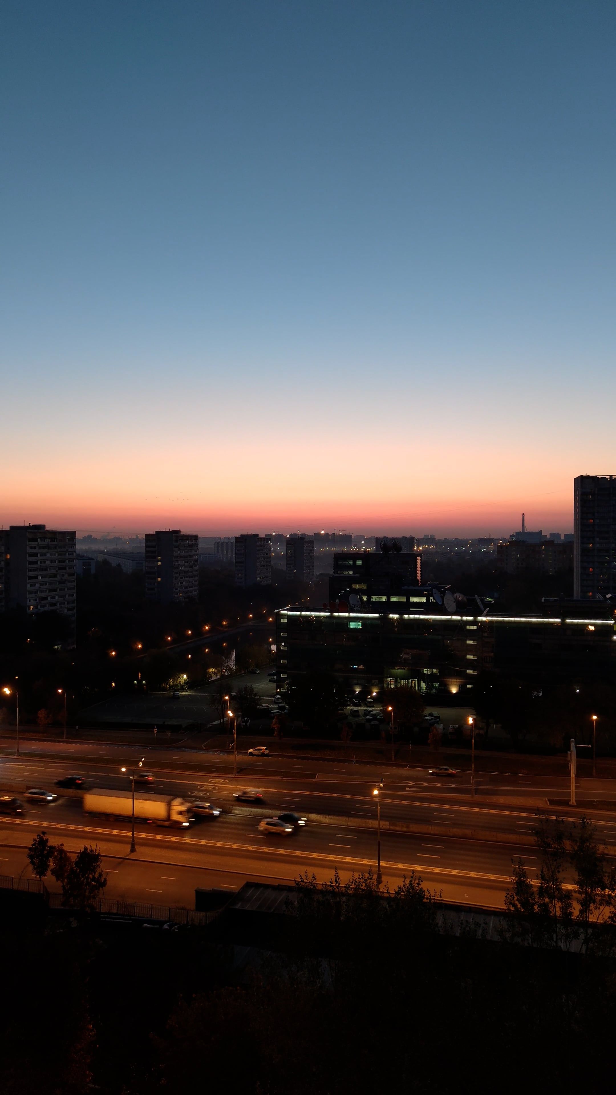 A view of a city street at sunset Free Stock Video Footage, Royalty ...