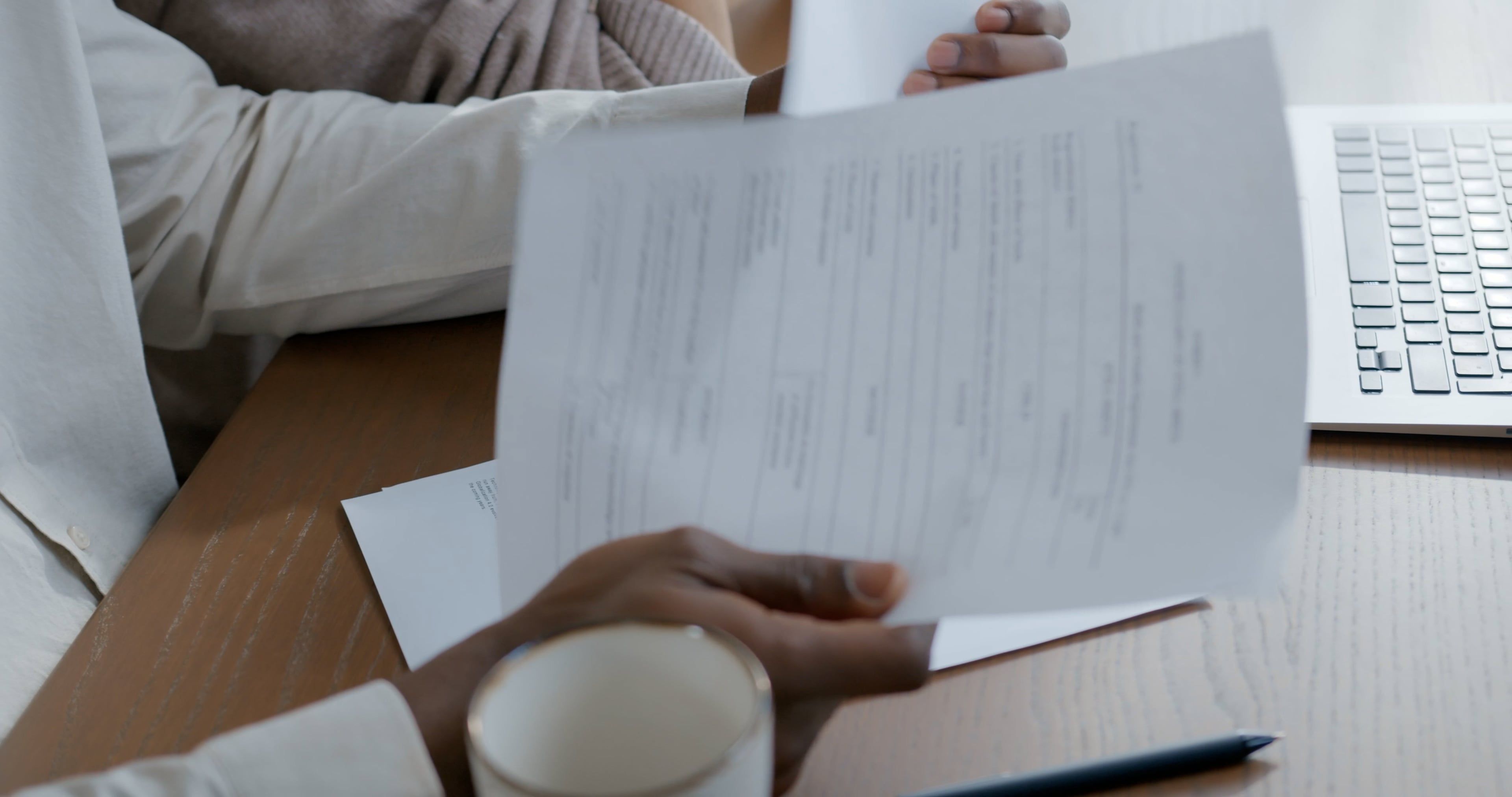 Close up on Mans Hands holding Documents on Table Free Stock Video ...