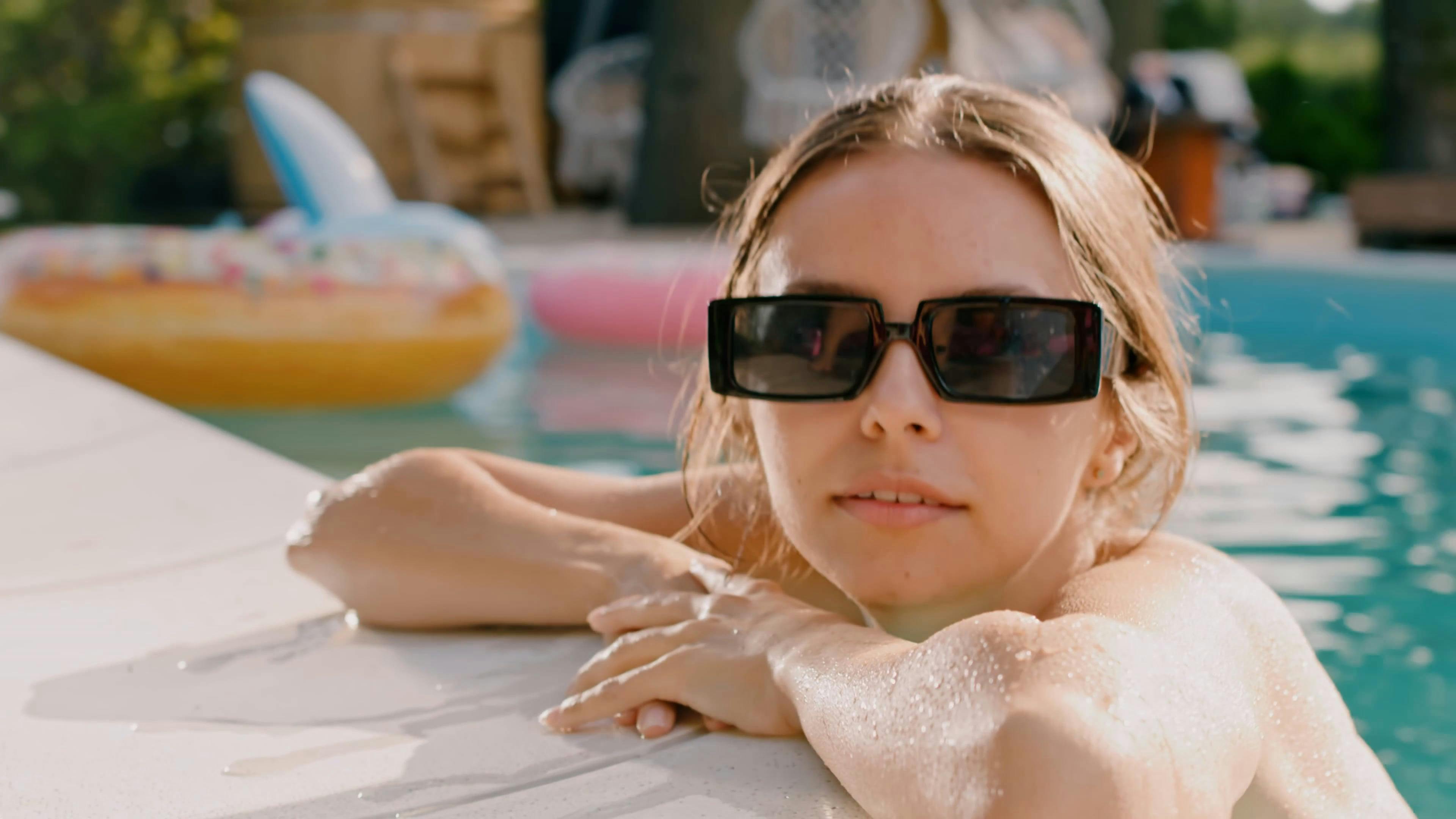 A Female Model Posing in a Swimming Pool Free Stock Video Footage ...