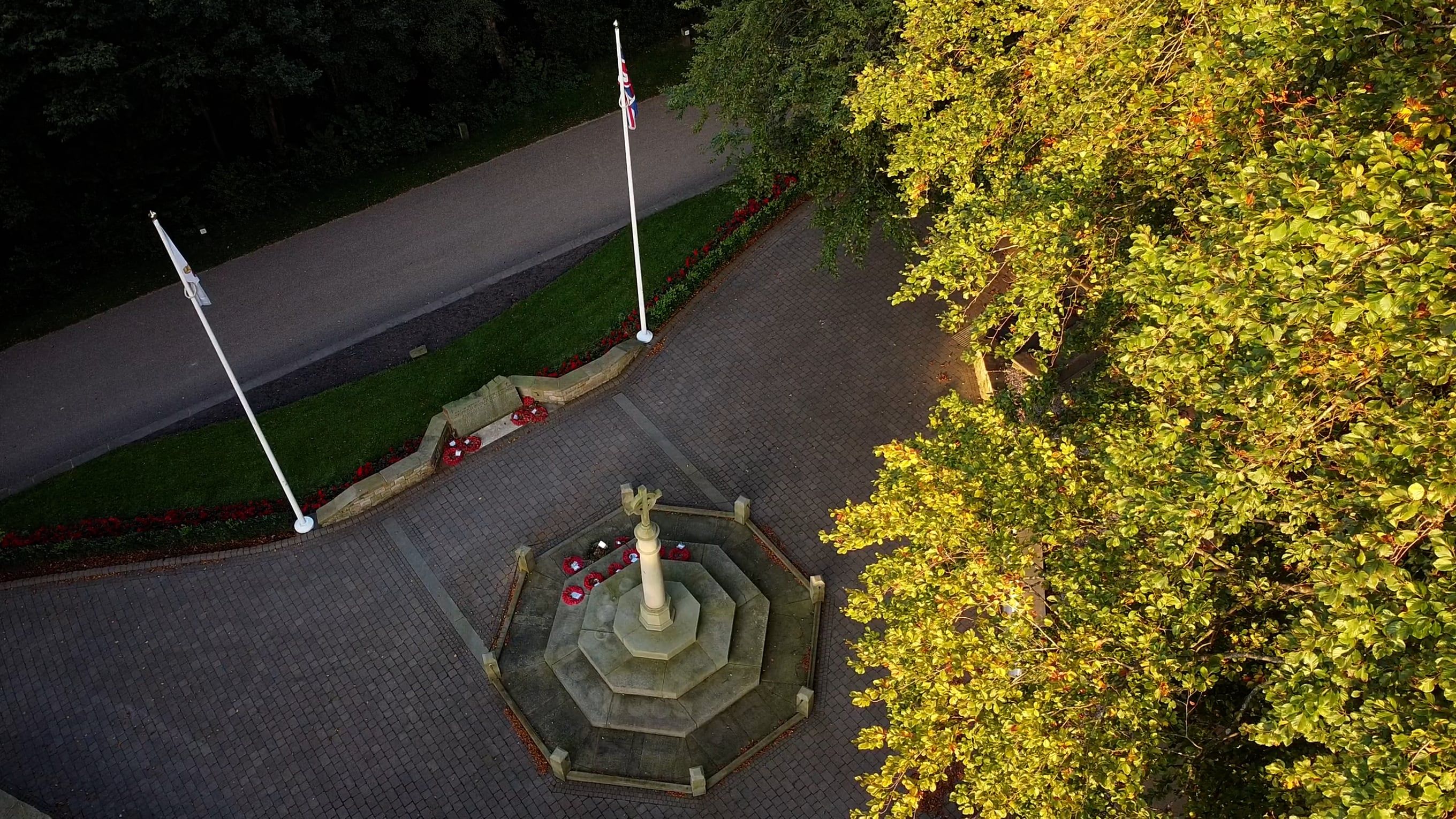 Aerial View of Cenotaph with Poppy Wreaths · Free Stock Video